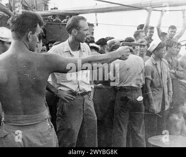 THE CEASE FIRE. AUGUST 1945, ON BOARD HMS KING GEORGE V OFF THE ...