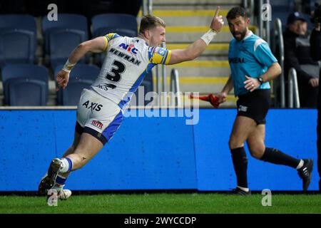Harry Newman of Leeds Rhinos celebrates his try during the Betfred ...