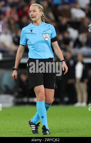 Referee Tess Olofsson, of Sweden, on the pitch during warmup before the ...