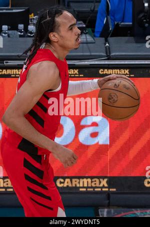 Portland Trail Blazers guard Dalano Banton (5) drives past Denver ...
