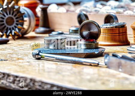 The precise art of horology unfolds as a watchmaker sets wheels in ...