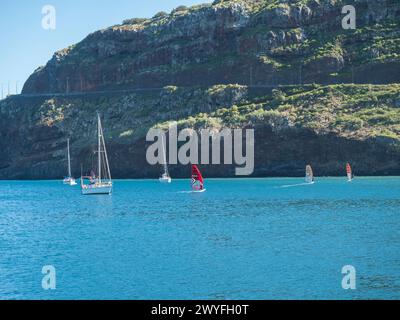 Sailing ships and yachts at Machico bay, Madeira, Portugal. Machico is ...