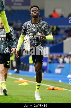 Arsenal's Bukayo Saka warms up ahead of the UEFA Champions League ...