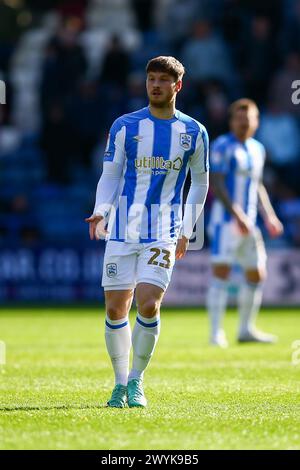 Ben Wiles #23 of Huddersfield Town has a shot at goal during the Sky ...