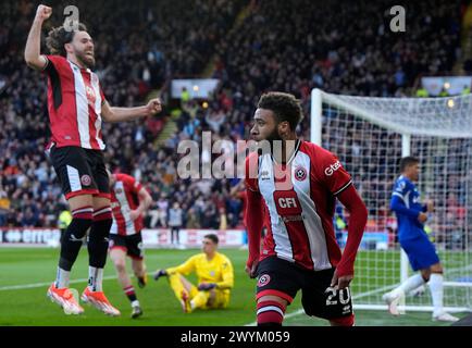 Sheffield United's Jayden Bogle (right) celebrates scoring their first ...