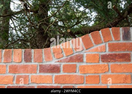 Neatly executed new brick wall using a Suffolk/Flemish bond and some ...