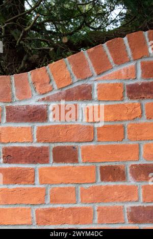 Neatly executed new brick wall using a Suffolk/Flemish bond and some ...