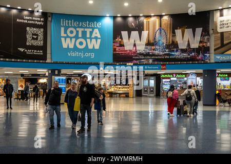 Shopping concourse in Penn Station is well lit, 2024, New York City ...
