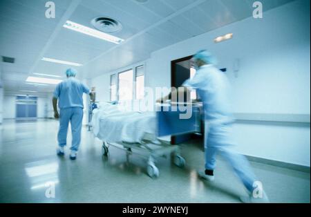 Nurses carrying stretcher Stock Photo - Alamy