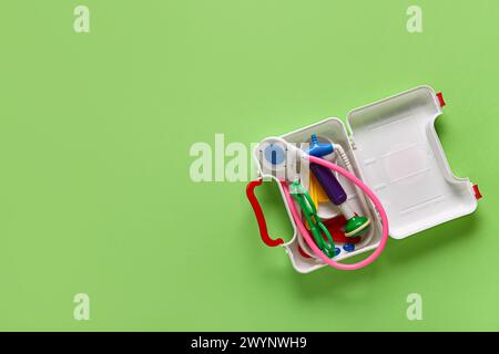 Open toy first aid kit on grey background. Top view Stock Photo - Alamy