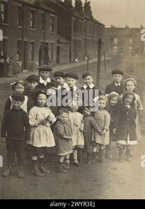 A photograph of a group of children taken on August 31, 1922, capturing ...