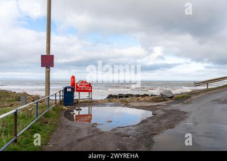 Large warning sign with falling rocks in Rock Fall Area. Danger of ...