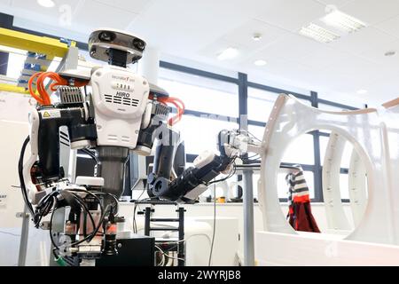 Humanoid robot for automotive assembly tasks in collaboration with ...