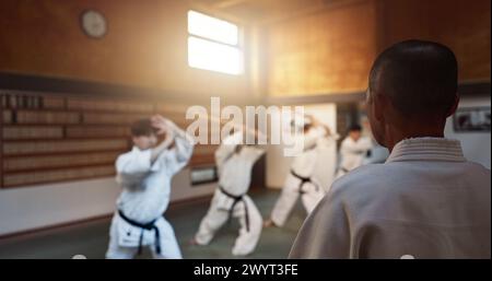 Aikido, group and class with sensei, weapon training and wooden sword ...