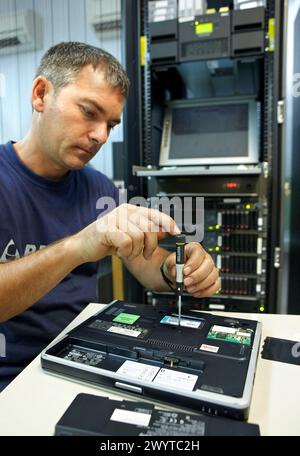 Precision screwdriver, computer maintenance Stock Photo - Alamy