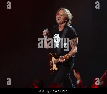 Keith Urban performs onstage during the 59th CMA Awards at the ...