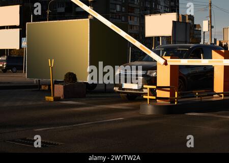 Automatic barrier gates for supermarket parking lot. Security system ...