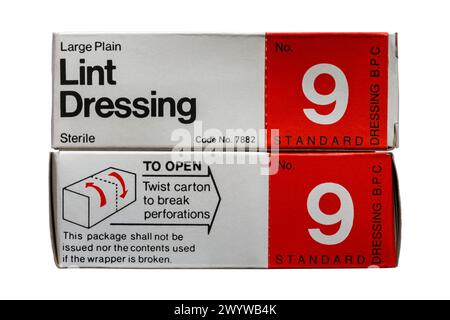 Packs of Lint dressing with instructions to open isolated on white ...
