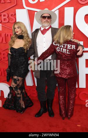 John Carter Cash and Ana Christina Cash walk the red carpet before the ...
