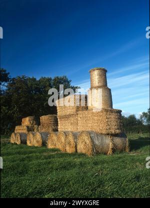 Steam train sculpture made from hay bales in field at the side of the ...