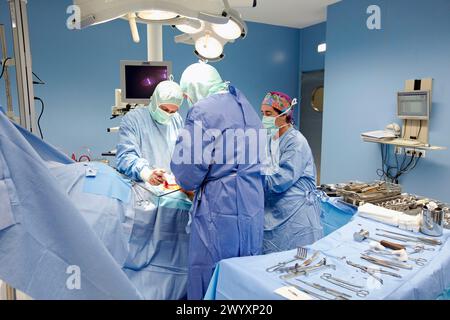 Hip joint replacement, traumatology operating room. Hospital ...