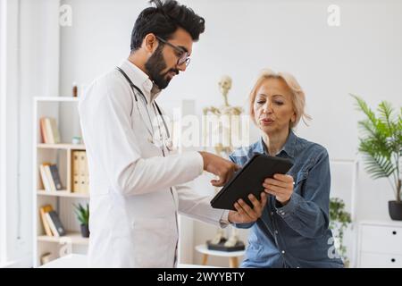 Young specialist writing instruction for taking medication correctly ...