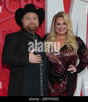 Paul Walter Hauser, Amy Elizabeth Boland attend the 2024 CMT Music ...