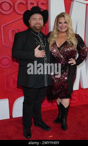 Paul Walter Hauser, Amy Elizabeth Boland attend the 2024 CMT Music ...