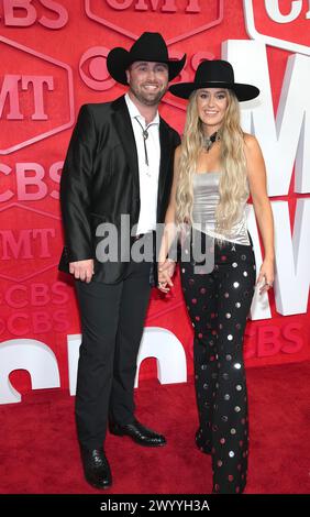 Lainey Wilson and Devlin "Duck" Hodges arriving at the 59th Annual ...