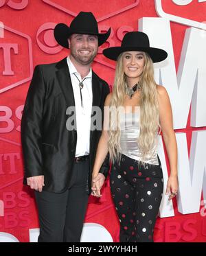 Lainey Wilson and Devlin "Duck" Hodges arriving at the 59th Annual ...