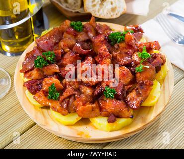 Morro de cerdo a la gallega - spanish dish. Roast nose and cheek pigs ...