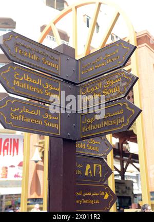 Direction signs for the different souks in Deira, Dubai, UAE Stock ...