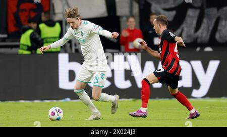 Mario Goetze (Eintracht Frankfurt, #27) in a duel with Ezequiel ...