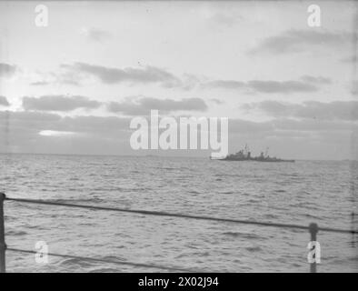 HMS EURYALUS, ON CONVOY DUTY IN THE EASTERN MEDITERRANEAN. 11-12 AUGUST 1942. - A cruiser at ...