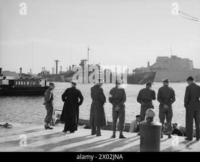 The supply ship SS Breconshire, escorted by Royal Navy warships ...