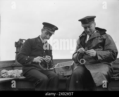 EXPLORING FOR AN ACOUSTIC MINE WITH SMALL EXPLOSIVE CHARGES. 1940, ON ...