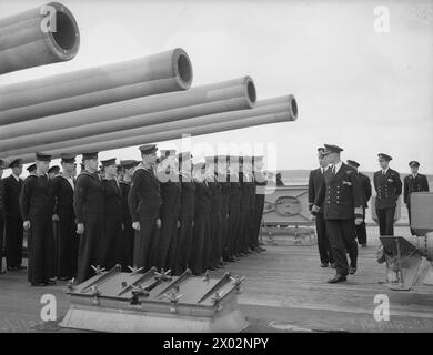 HMS ANSON HOLDS DIVISIONS AT FLEET ANCHORAGE. 28 JUNE 1942 ...