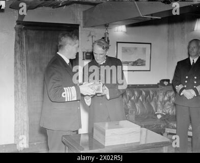 The Home Fleet presents a Holy Communion wafer box to Bishop Frederick ...