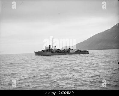 A British Hunt class destroyer operates in heavy seas while patrolling ...