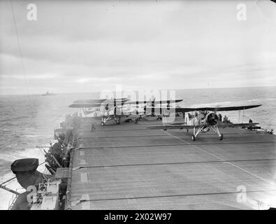 FAIREY SWORDFISH AIRCRAFT IN ACTION. JUNE 1944, ON BOARD THE ESCORT CARRIER HMS STRIKER AT SEA ...