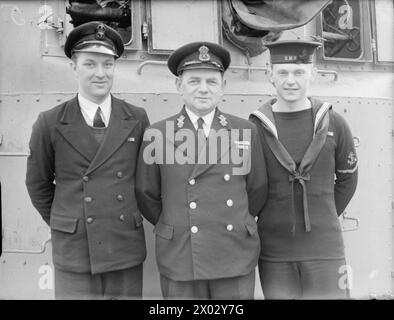 On 29 March 1944 at Harwich, officers and crew of HMS Puffin, a ...