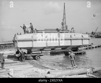 In April 1944 at Southampton, two prefabricated Mulberry Harbours were ...