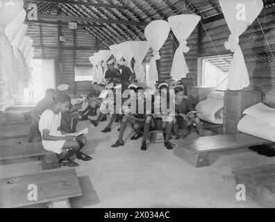 THE CEYLON RNVR ON WAR SERVICE. 1942, COLOMBO, CEYLON. OFFICERS AND MEN ...
