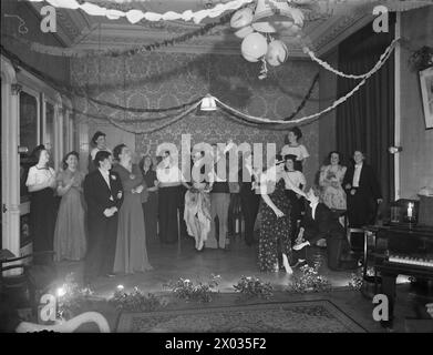 Chief Officer Nye and fellow WRNS officers perform the pantomime ...