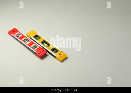 Building levels on beige background, top view. Space for text Stock ...