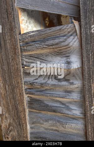 The remaining slats of a shutter on abandoned, miner's house, preserved ...