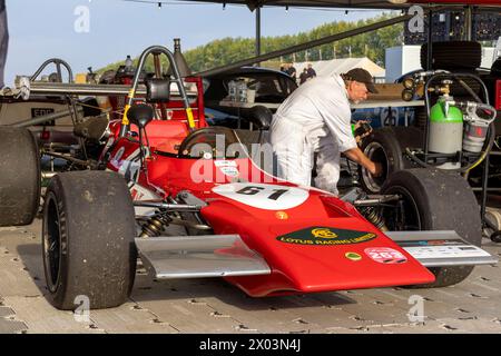 1969 Lotus 69 F2 racer in the paddock garage with mechanic. 75 Years of ...