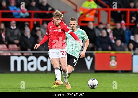 Andy Cannon of Wrexham passes the ball, during the Sky Bet League 2 ...