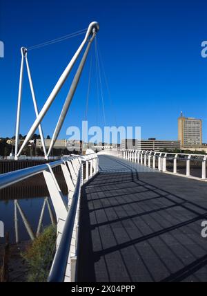 Iconic pedestrian cable stayed footbridge over the river Usk at Newport ...
