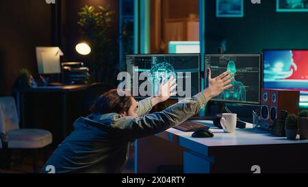 Programmer creating sentient AI, bowing in adulation to new overlord ...